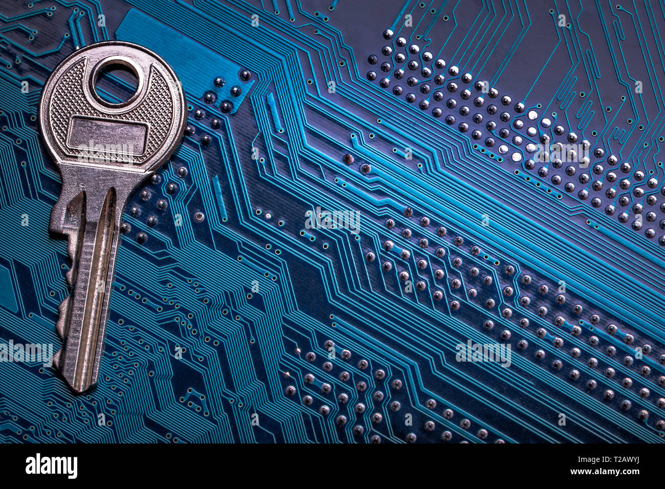 Background image of key on a microchip Stock Photo - Alamy