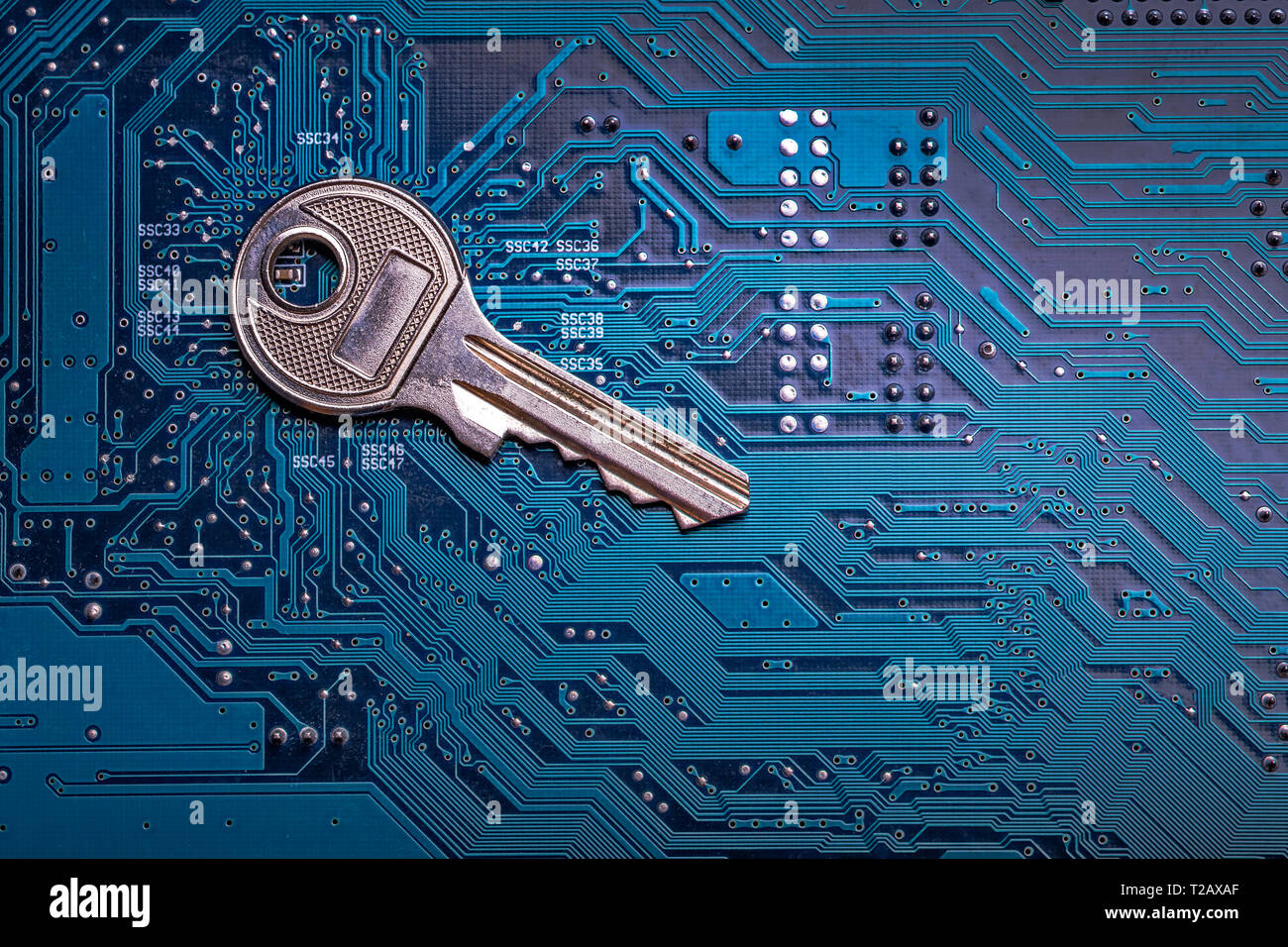 Background image of key on a microchip Stock Photo - Alamy