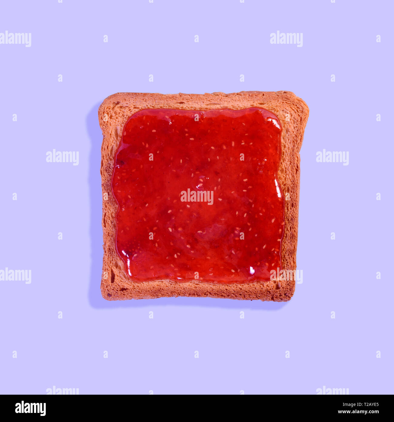 Toast with raspberry jam Stock Photo - Alamy