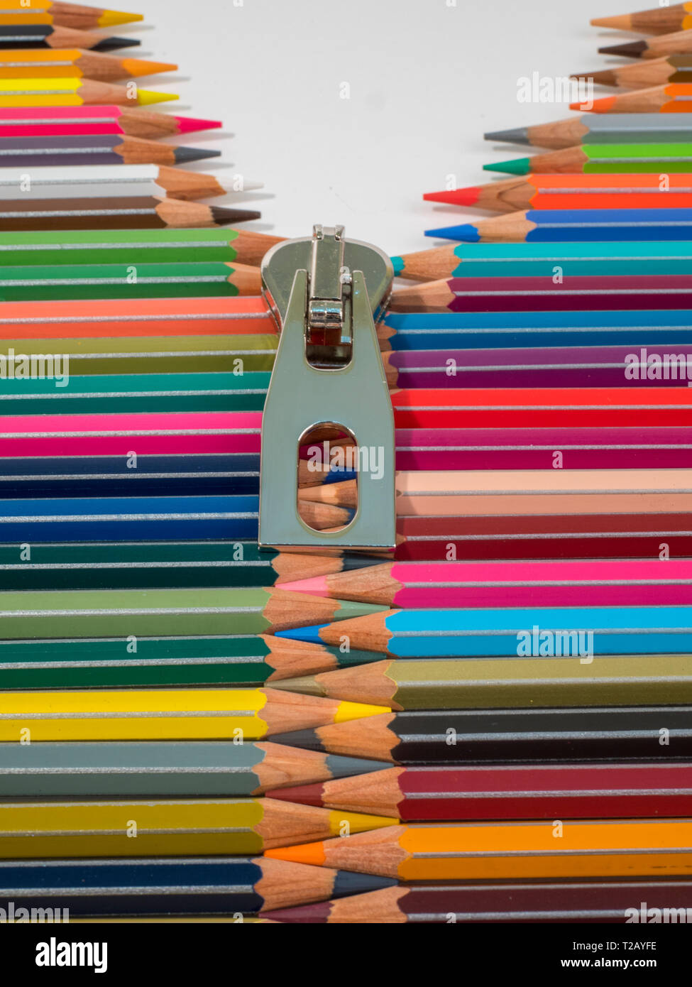 Sharpened coloured pencil crayons with a zip Stock Photo - Alamy