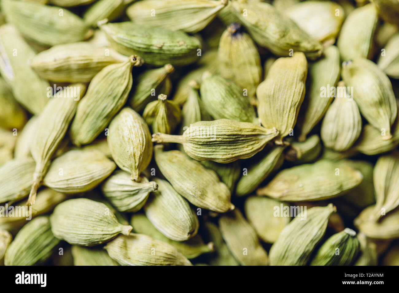 Dried green cardamom pods backdrop. View from above Stock Photo - Alamy