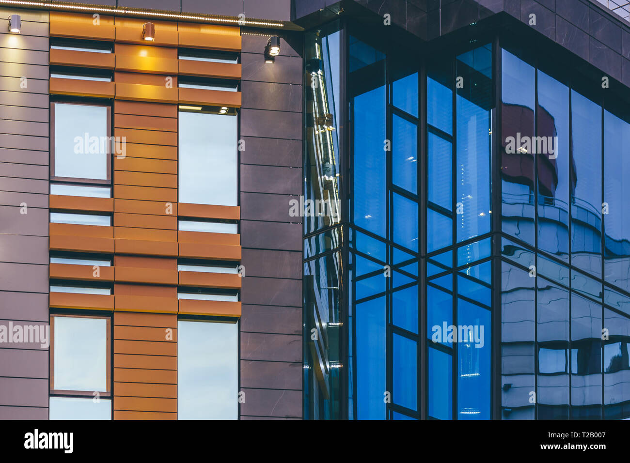 Modern high-rise office building with a glass facade, background Stock ...