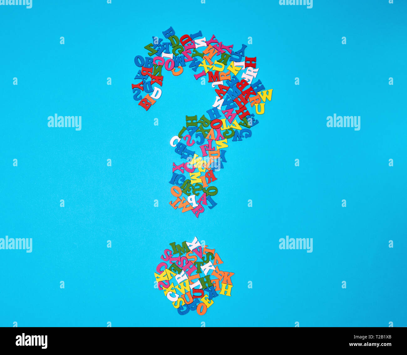 question mark figure from small multicolored wooden letters of the ...