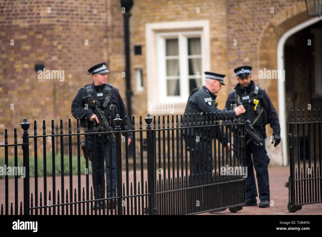 Uk policeman and gun hi-res stock photography and images - Alamy