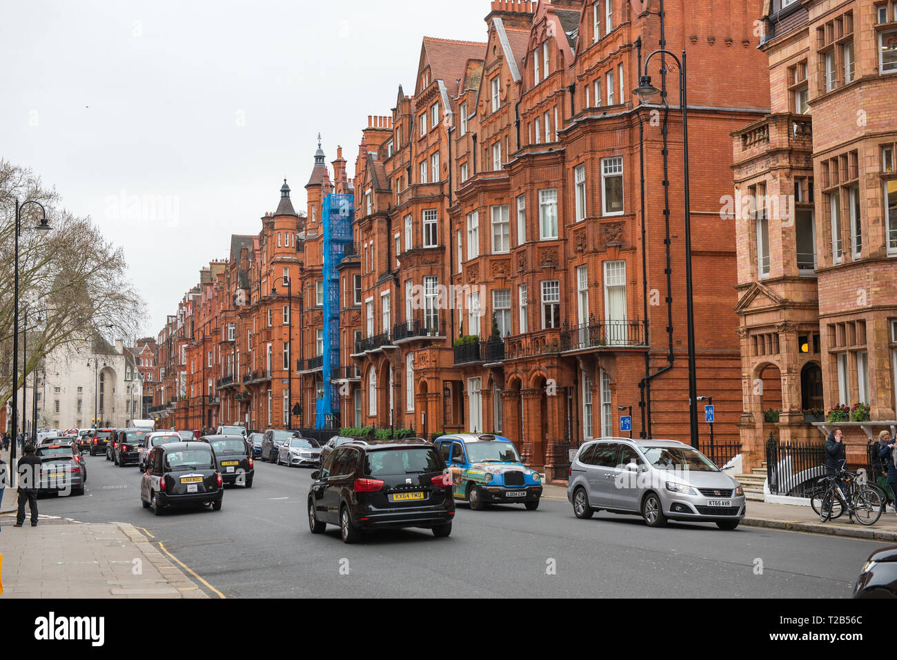 LONDON, UK - MARCH 22, 2019: People living their daily life on the busy ...