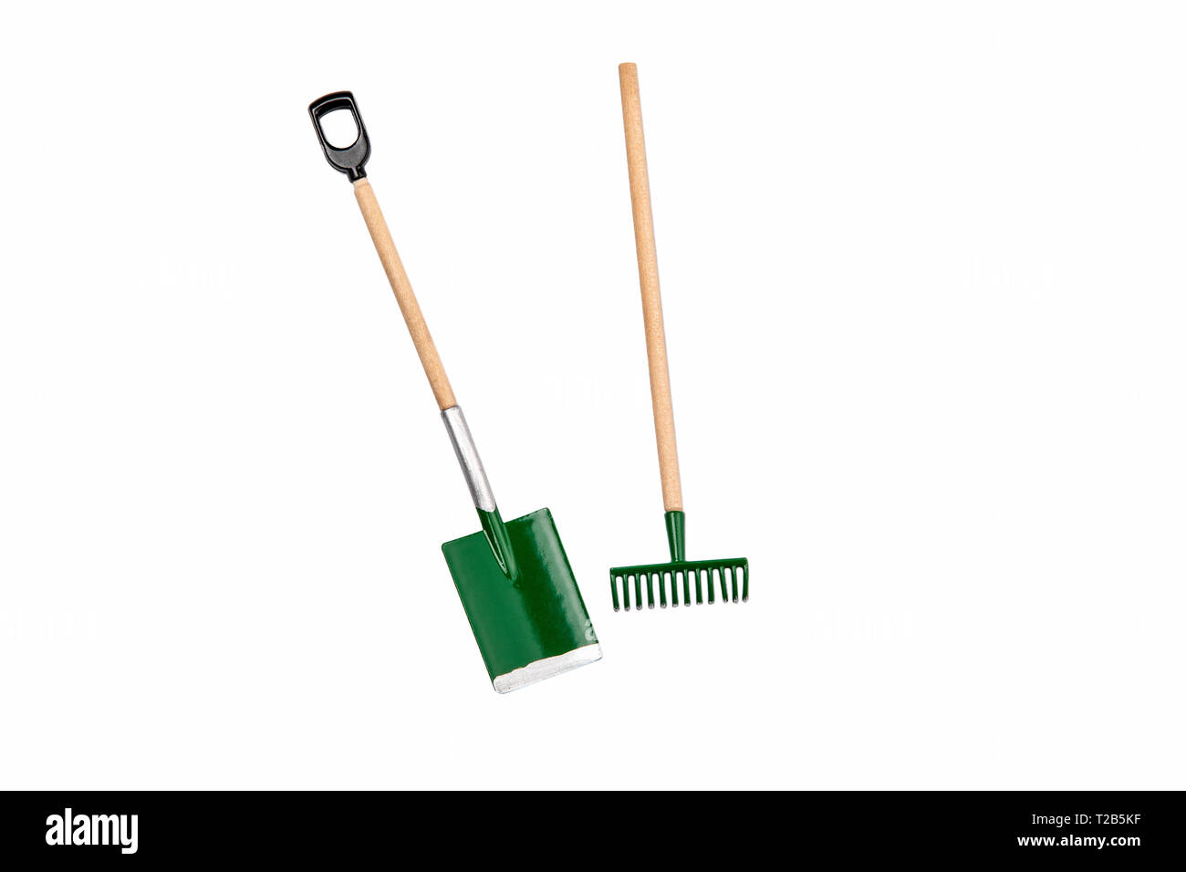 Small gardening rake and shovel isolated on white background Stock ...