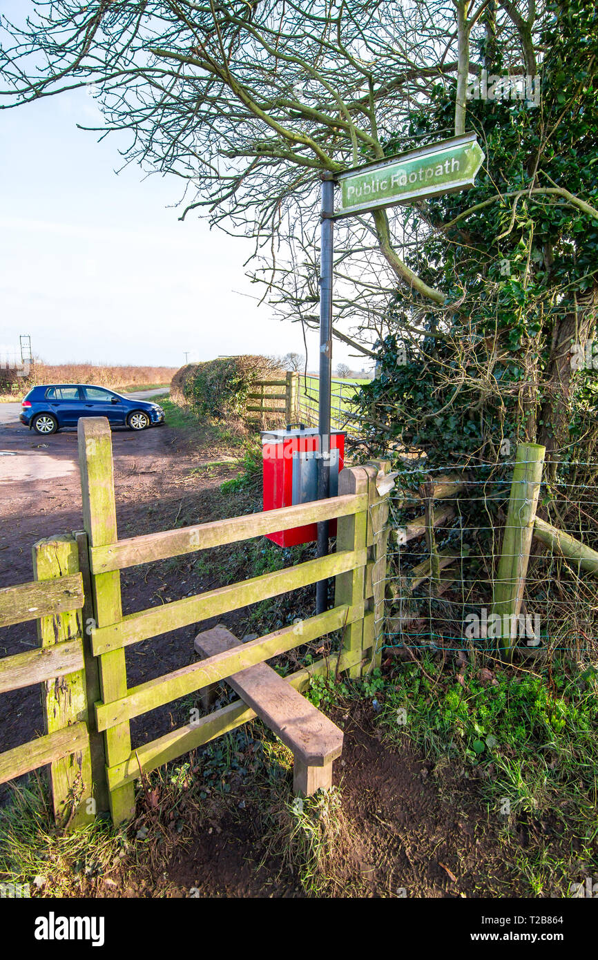 A gate for visitors to climb over at the entrance to a public park and ...