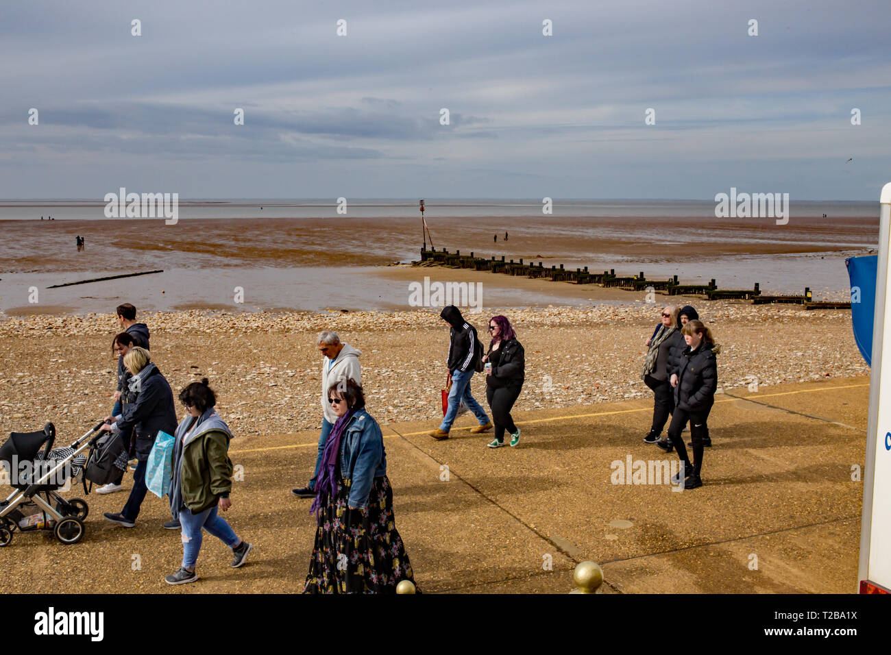 Hunstanton, England. 23 March 2019. A group of people enjoying a walk ...