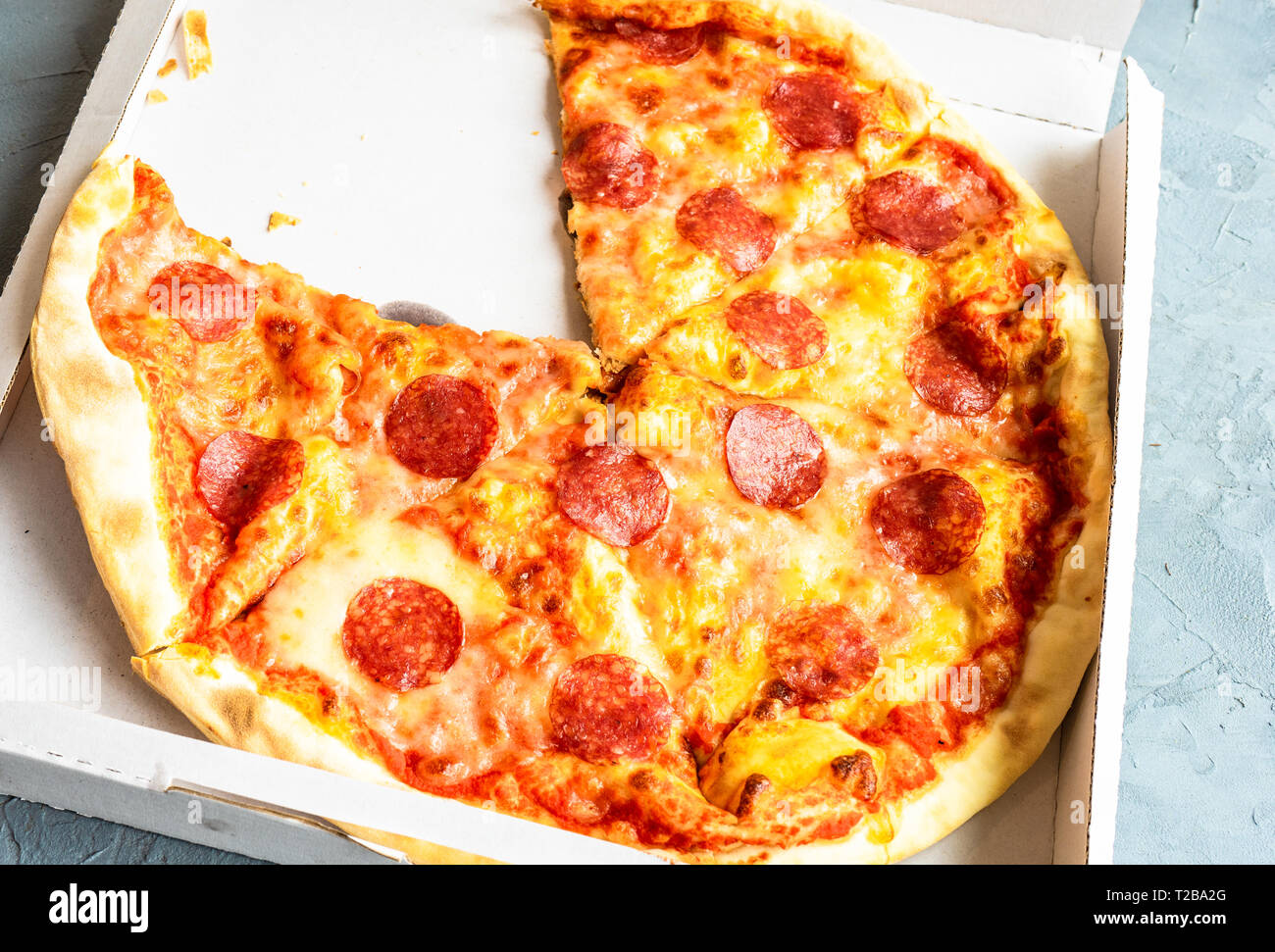 Italian pizza in slices in delivery box with copy space Stock Photo - Alamy