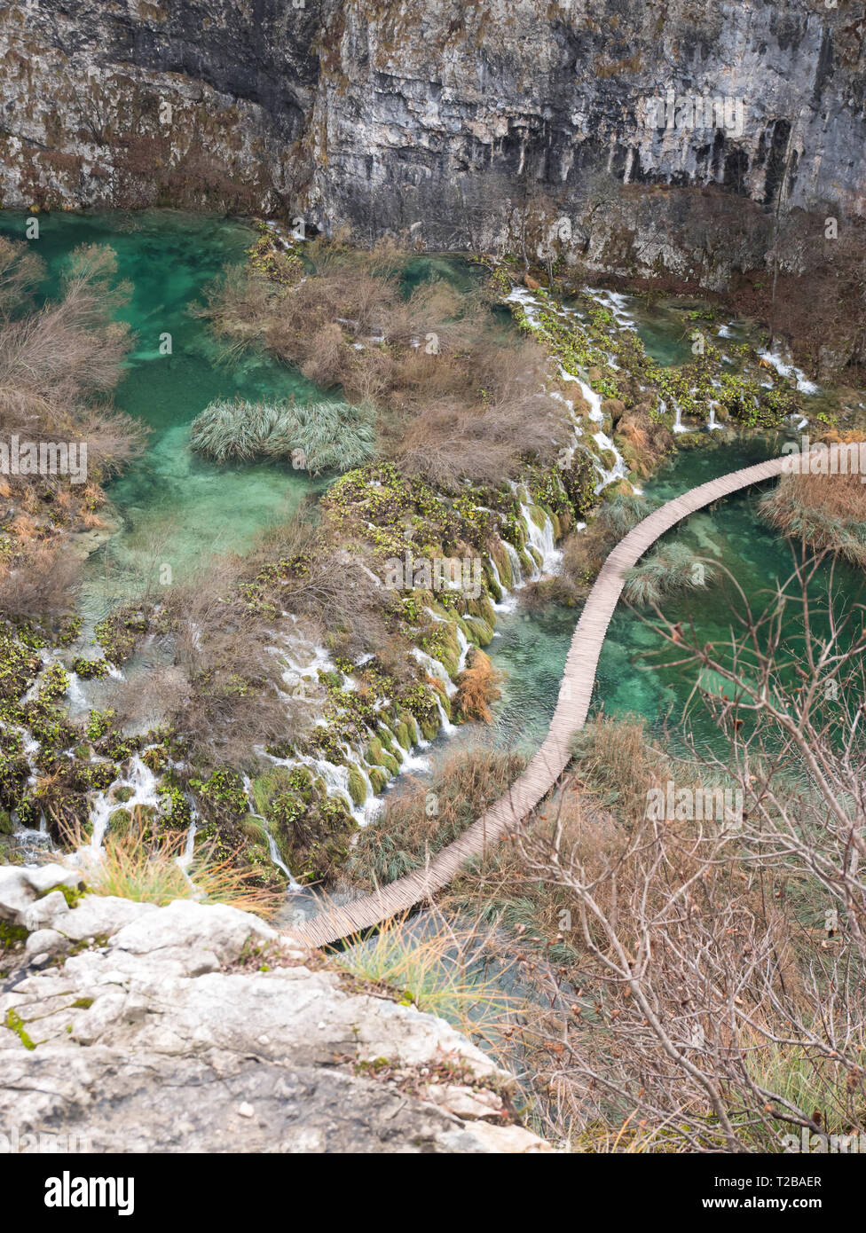 Wooden bridge in nature park Plitvice lakes in Croatia aerial view ...