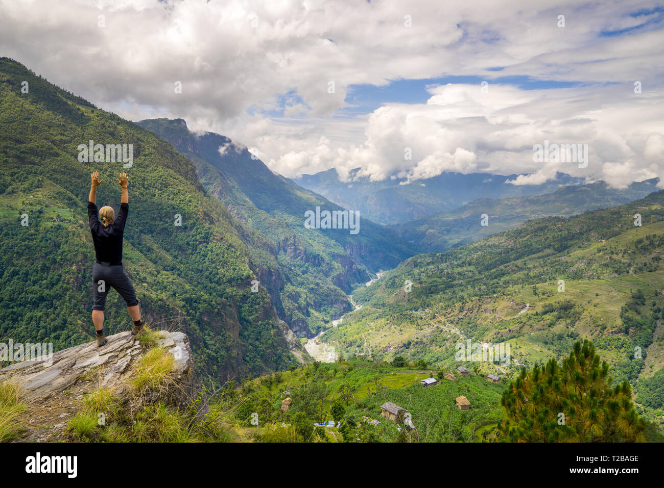 Man standing on top of the hill in Himalayas. Achievement and success ...