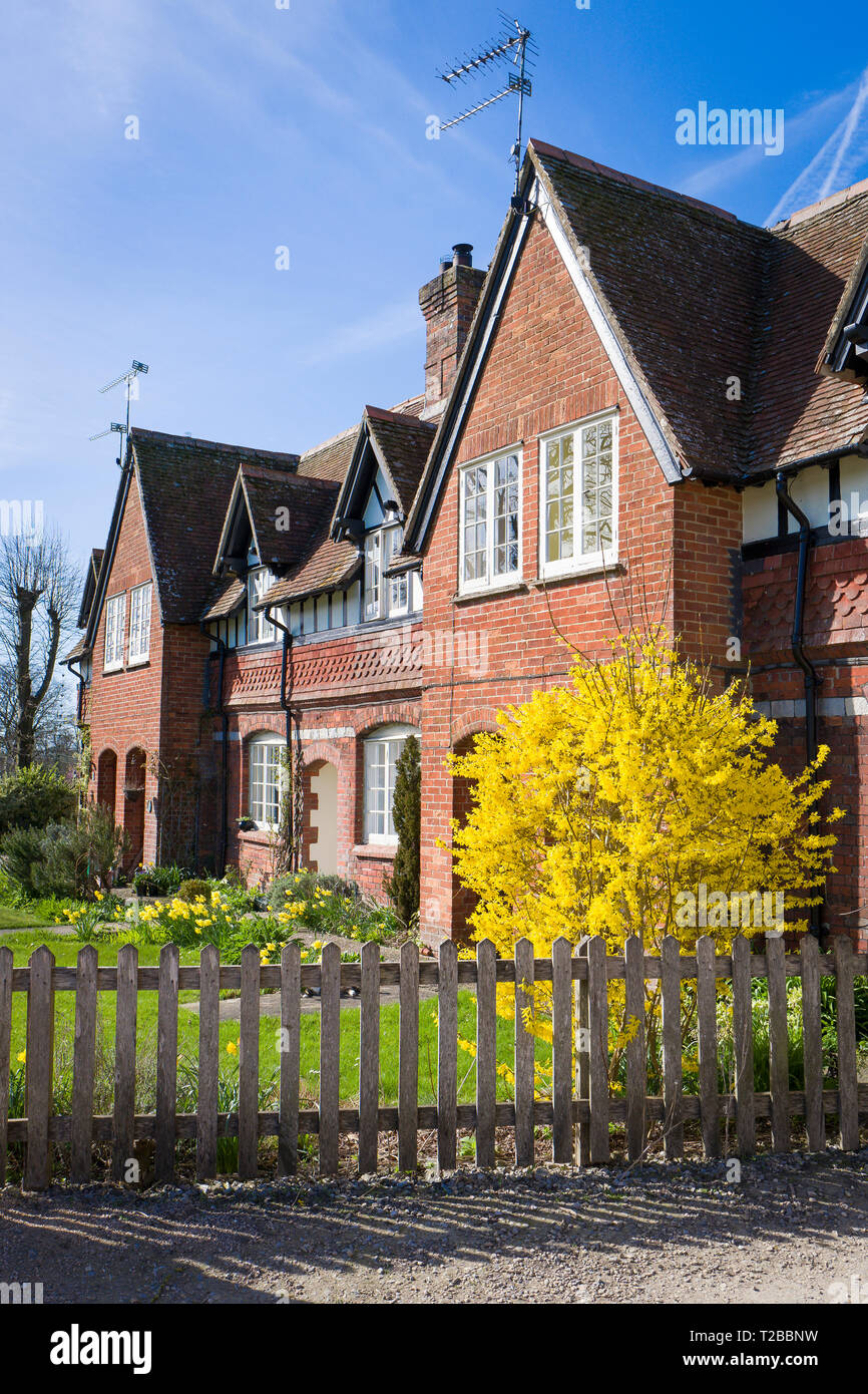 Old red brick terraced cottages in Avebury village Wiltshire England UK ...