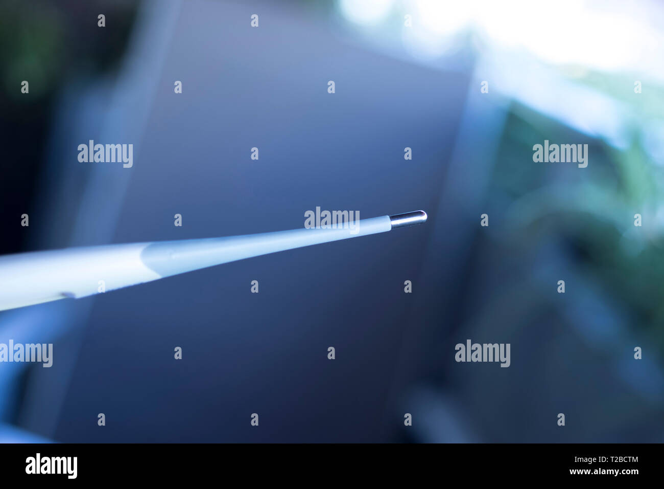 Digital medical thermometer instrument used by doctor or nurse to ...