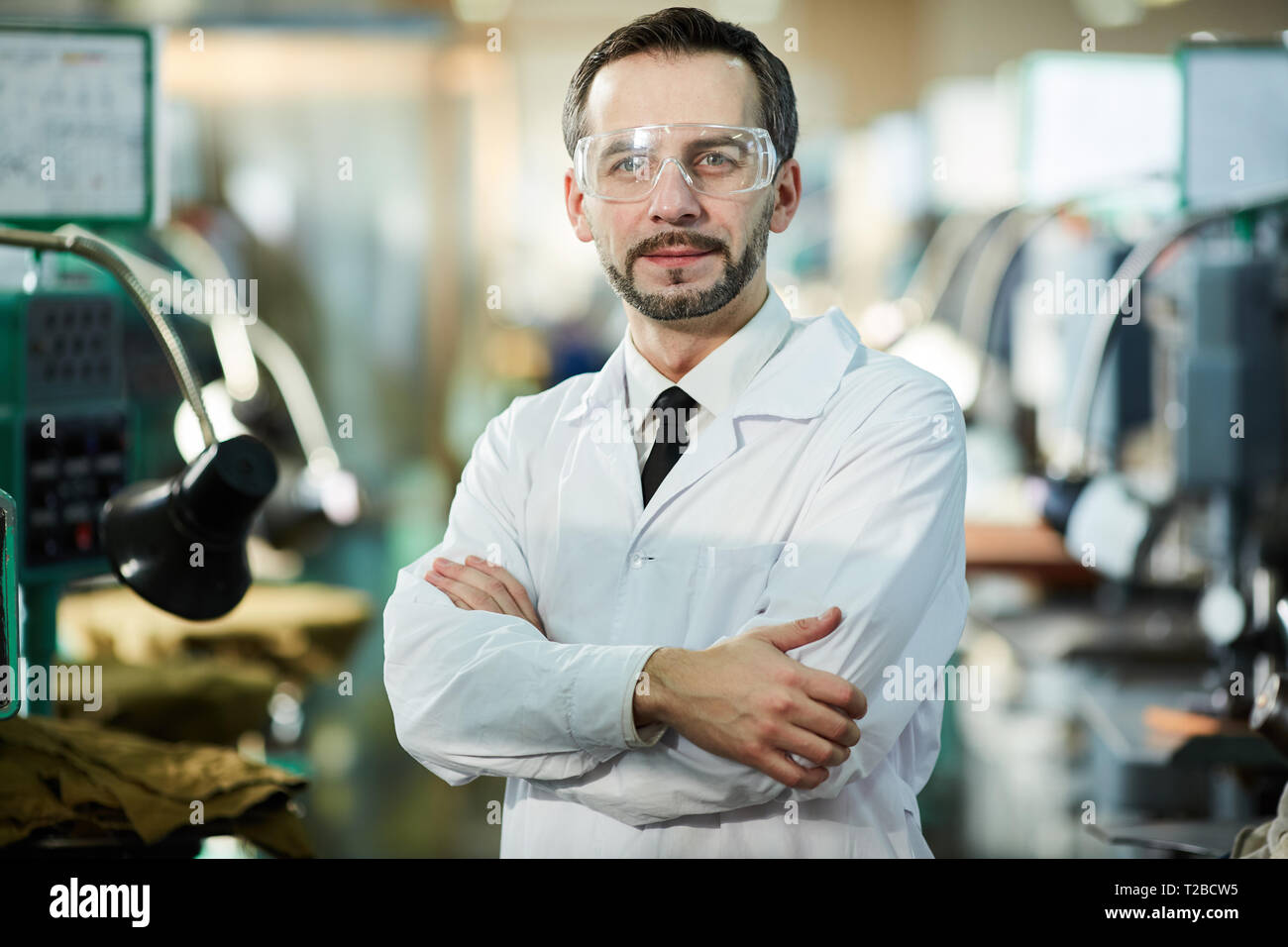 Factory Worker Wearing Lab Coat Stock Photo - Alamy
