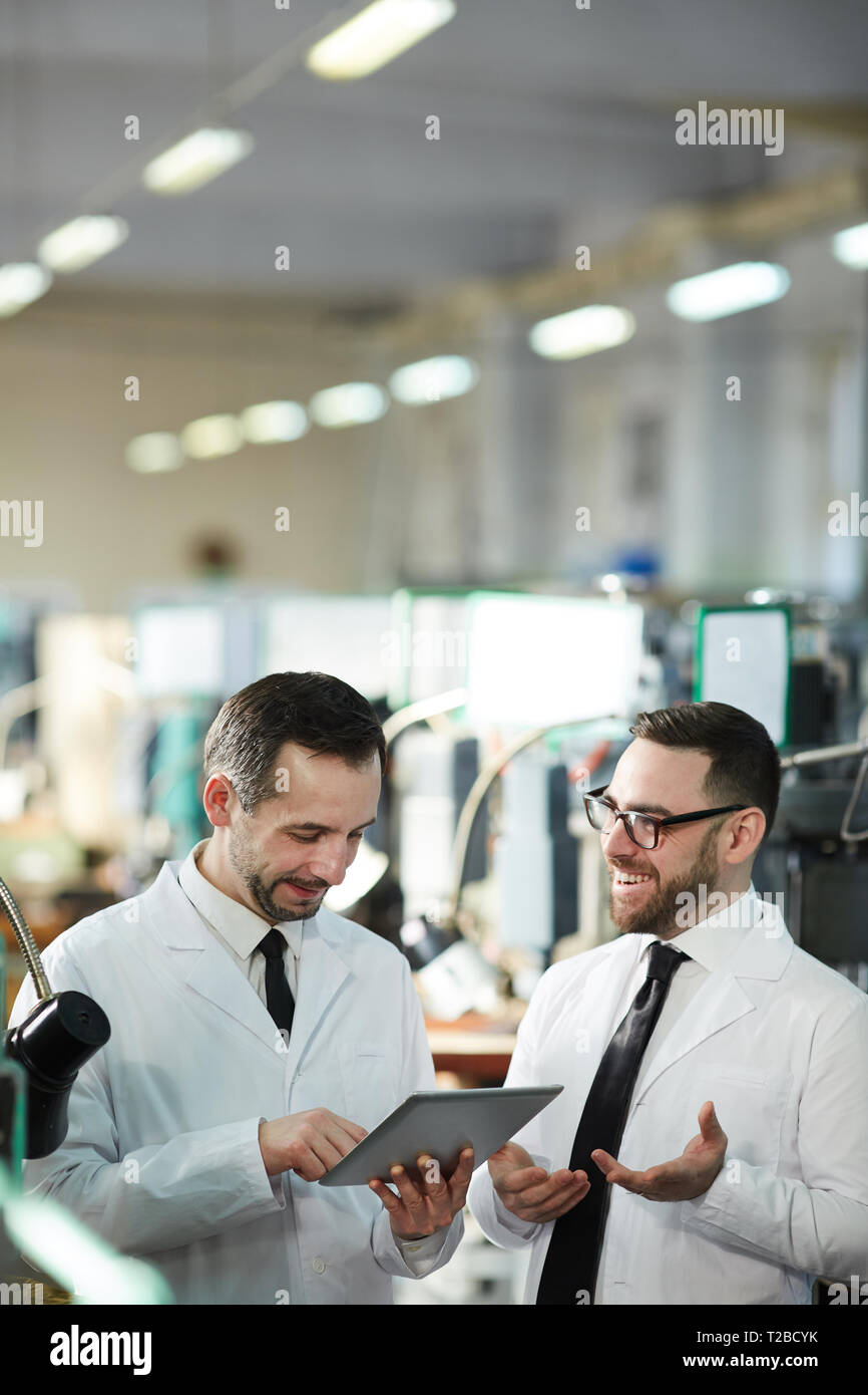 Workers at Modern Production Factory Stock Photo - Alamy