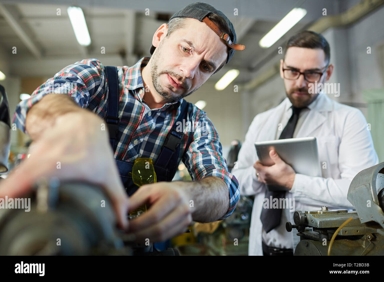 Machines at factory hi-res stock photography and images - Alamy