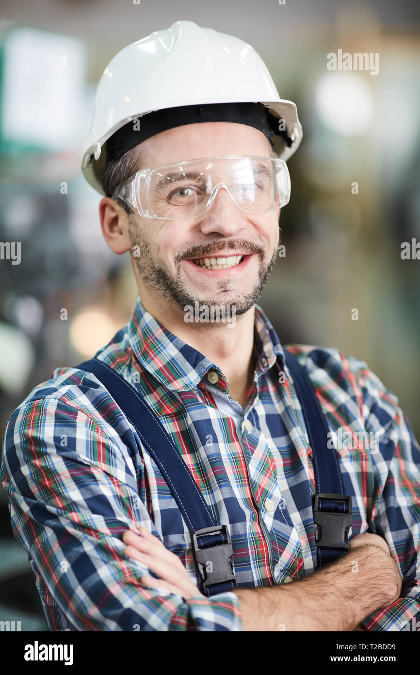 Mature Factory Worker Smiling Stock Photo - Alamy