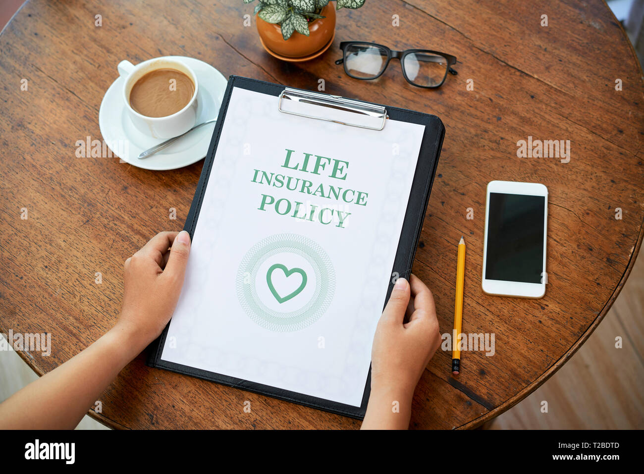 Life insurance policy contract Stock Photo - Alamy
