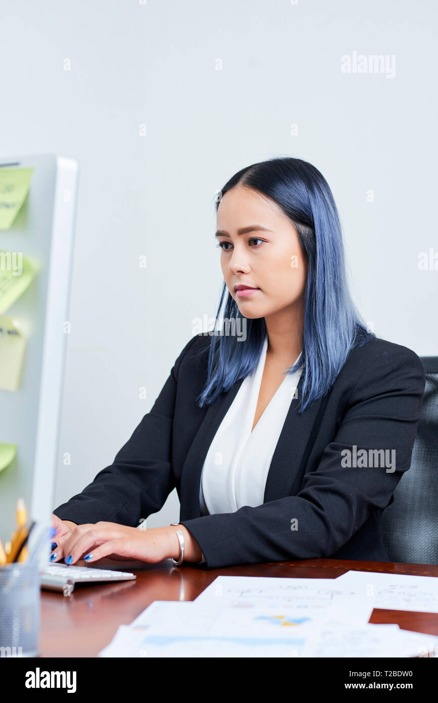 Business lady concentrated on work Stock Photo - Alamy