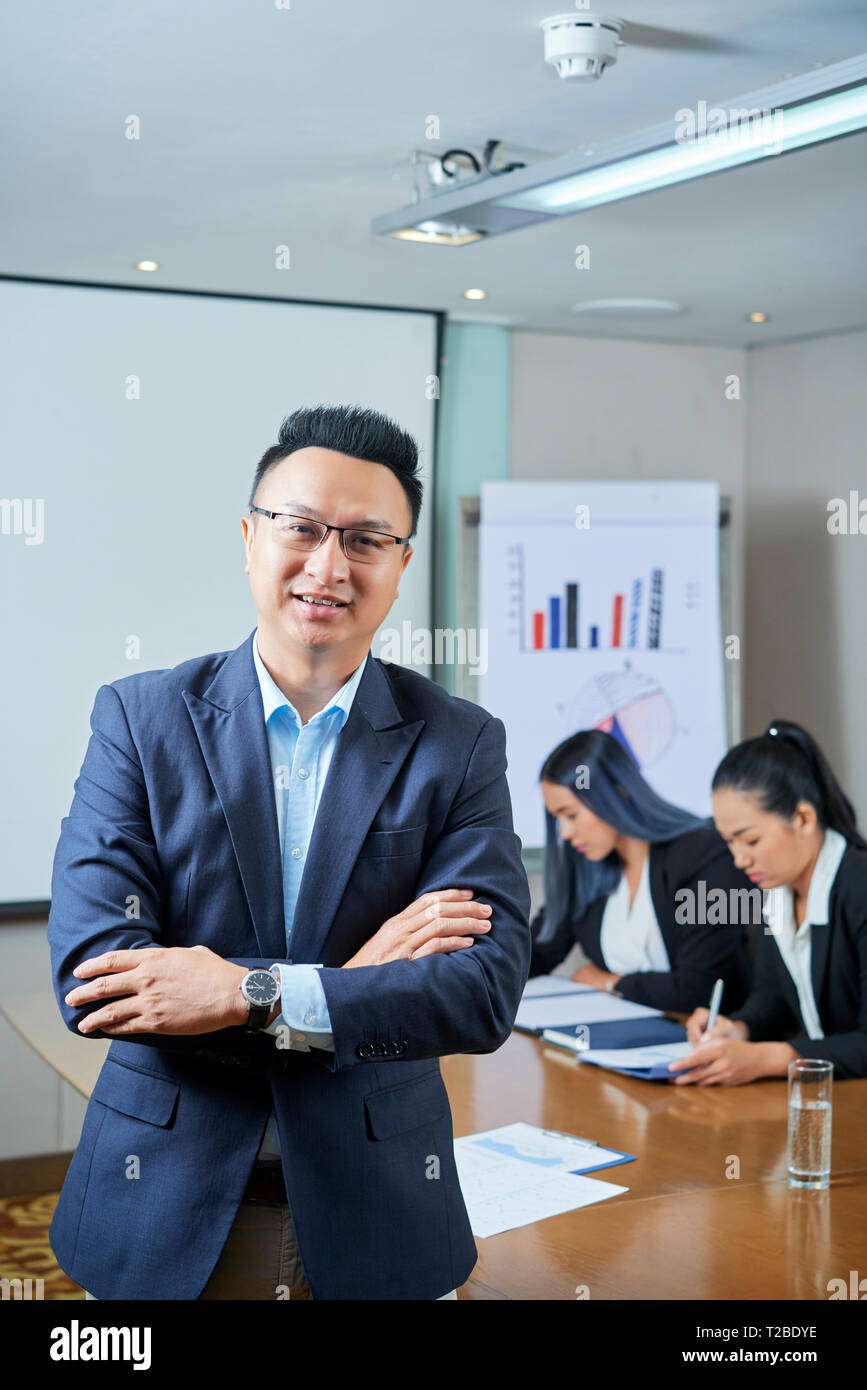 Positive Asian businessman Stock Photo - Alamy