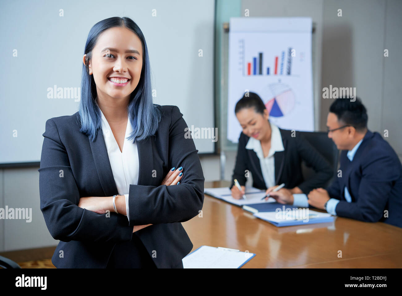 Pretty female entrepreneur Stock Photo - Alamy