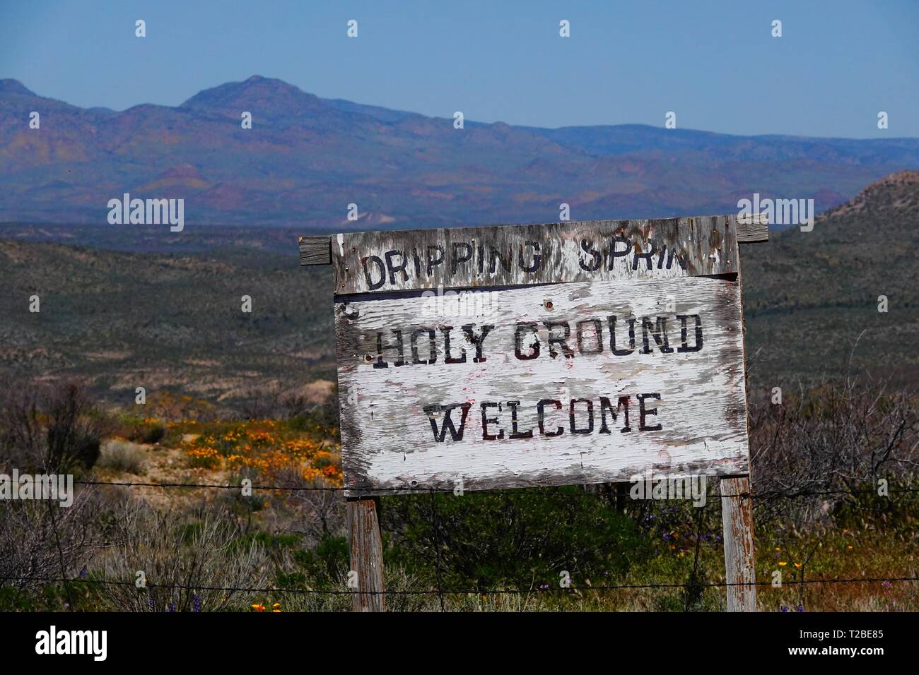 A sign posted in the middle of the desert outside of Globe, Arizona ...