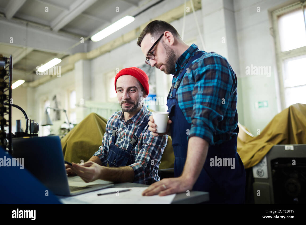 Controlling production machine hi-res stock photography and images - Alamy