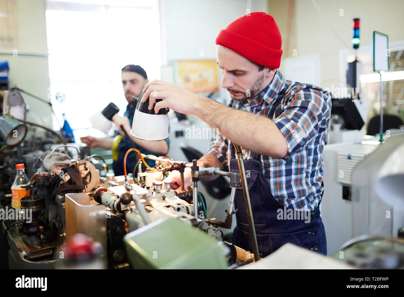 Worker Setting Up Station Stock Photo - Alamy