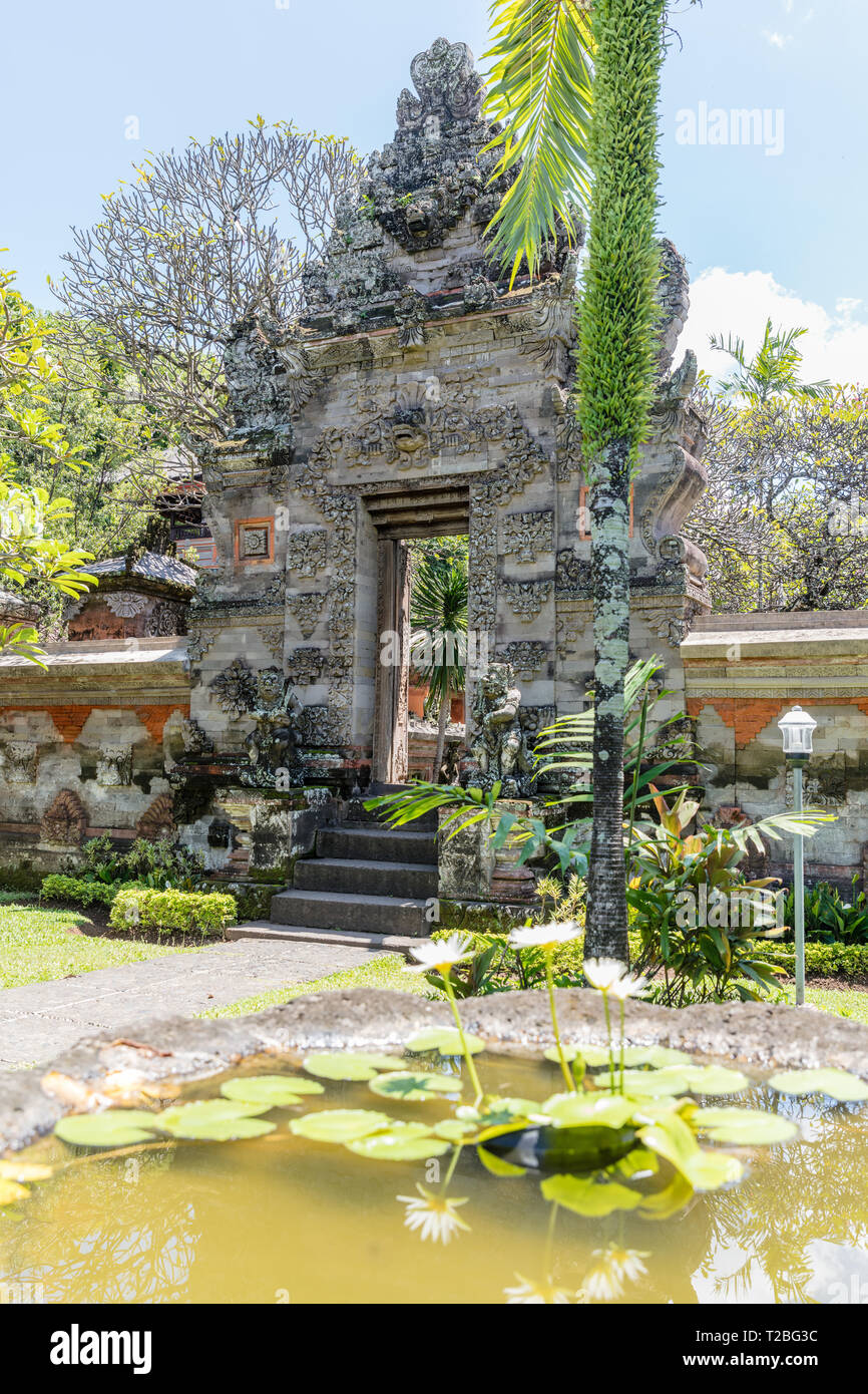 Entrance gates (paduraksa) with stone carving at Bali Museum in ...