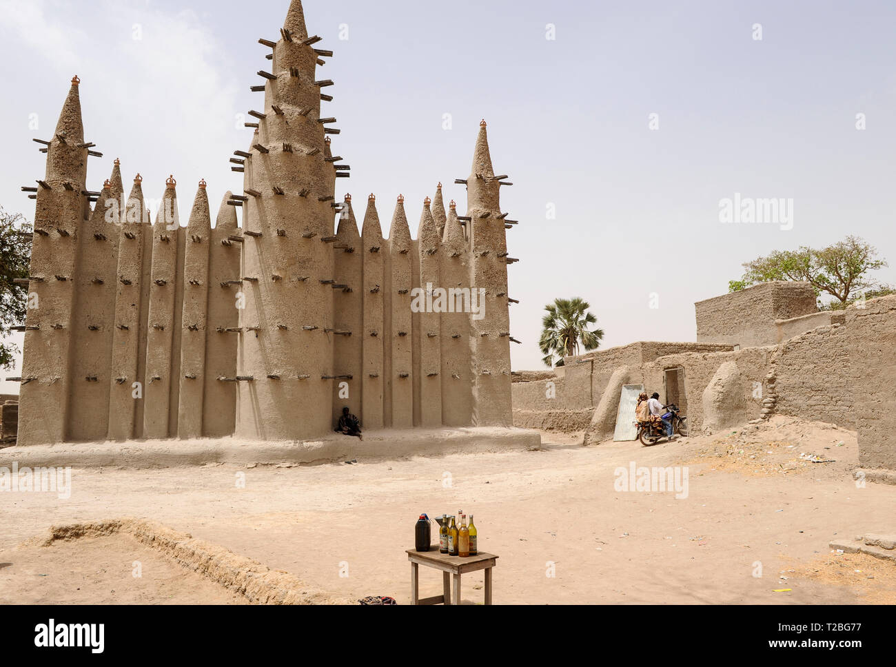 MALI, Mopti, mosque built from clay, fuel bottle for sale Stock Photo ...