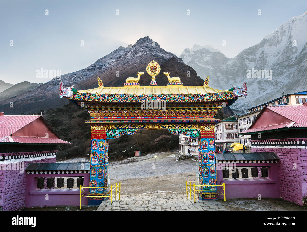 Tengboche monastery's front gate with mountains in the background ...