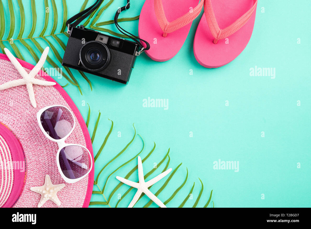 Beach accessories retro film camera, sunglasses, flip flop, starfish ...