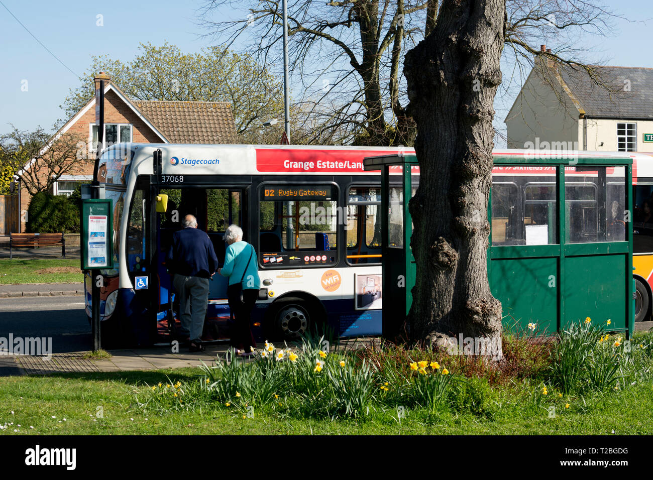 A local bus at a bus stop in High Street, Hillmorton, near Rugby ...