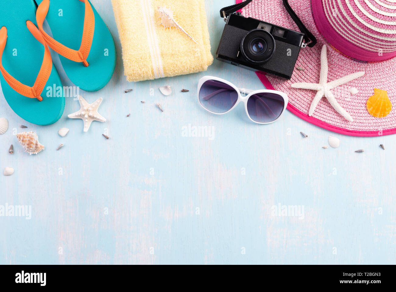 Beach accessories retro film camera, sunglasses, flip flop, starfish ...