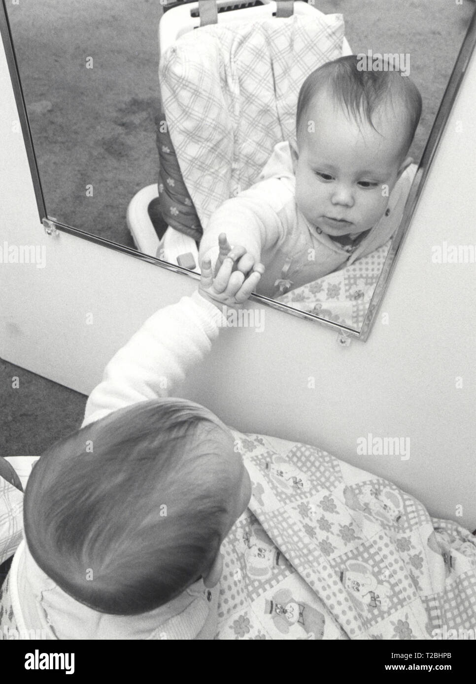 Very young child begins to form a self-identity Stock Photo - Alamy
