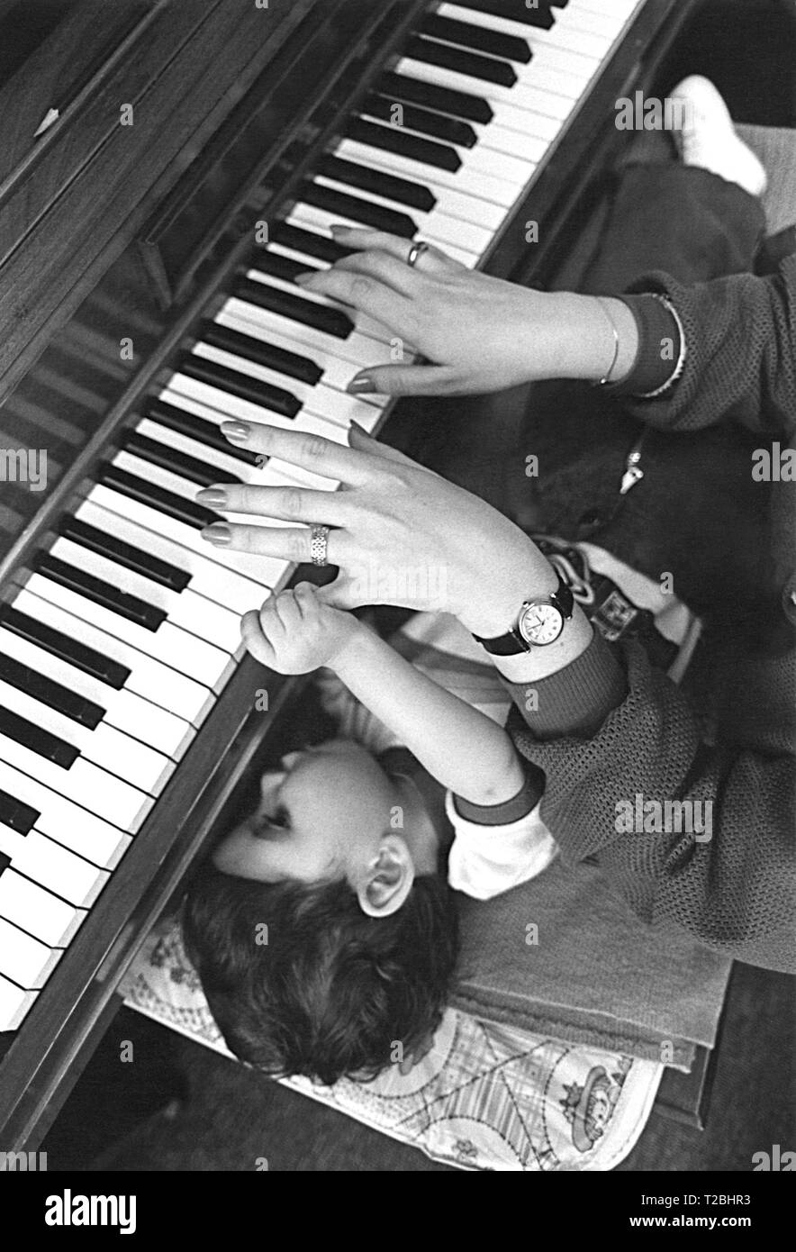 Blind Disabled child having music therapy Stock Photo - Alamy