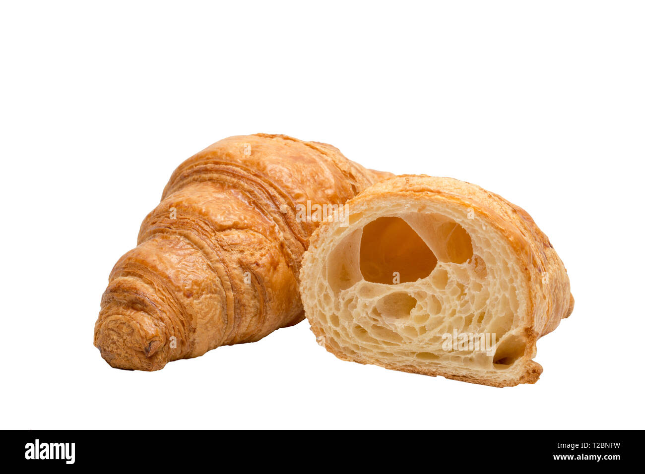 One plain croissant and half cut croissant isolated on white background ...
