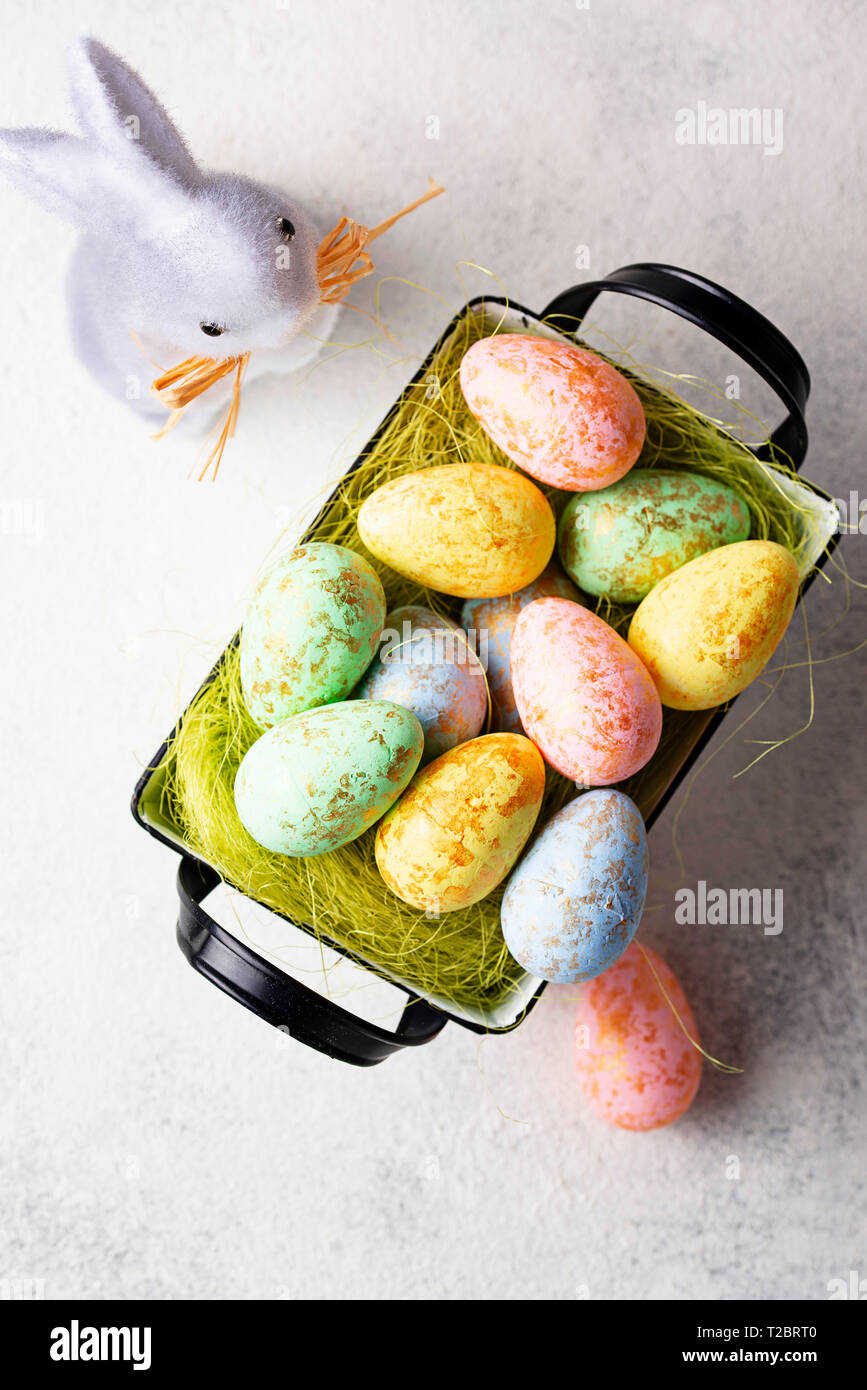 Easter background with decorative colorful eggs and bunny Stock Photo ...