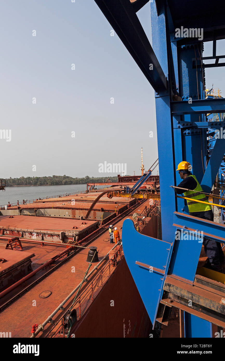 Port operations for managing and transporting iron ore. Marine worker ...