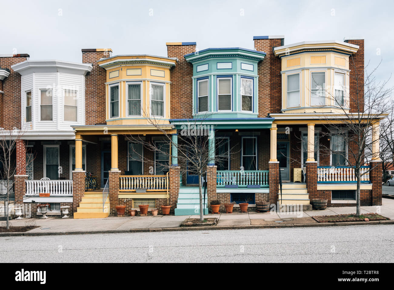 Colorful brick row houses in Charles Village, Baltimore, Maryland Stock ...