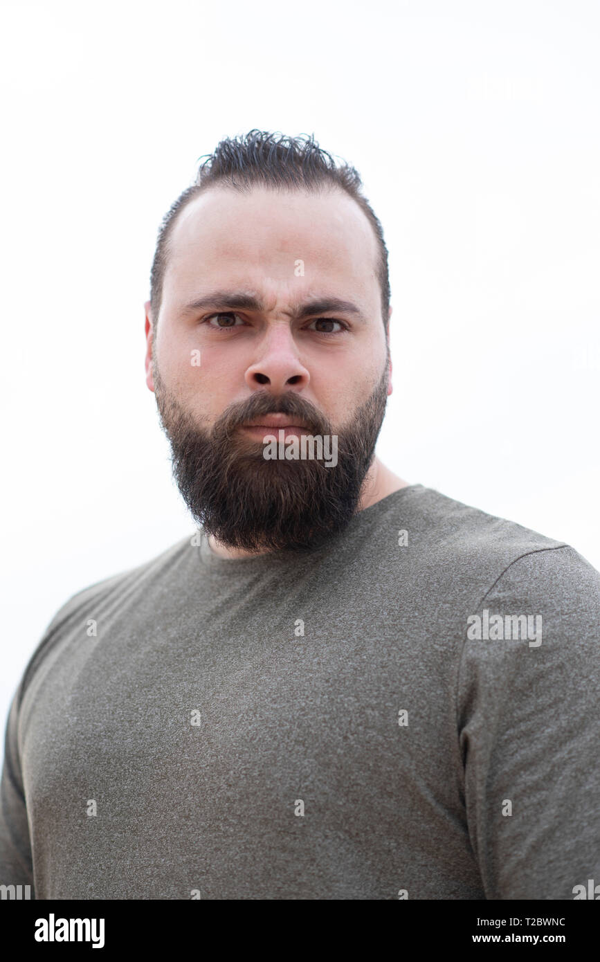 Angry bearded man staring Stock Photo - Alamy