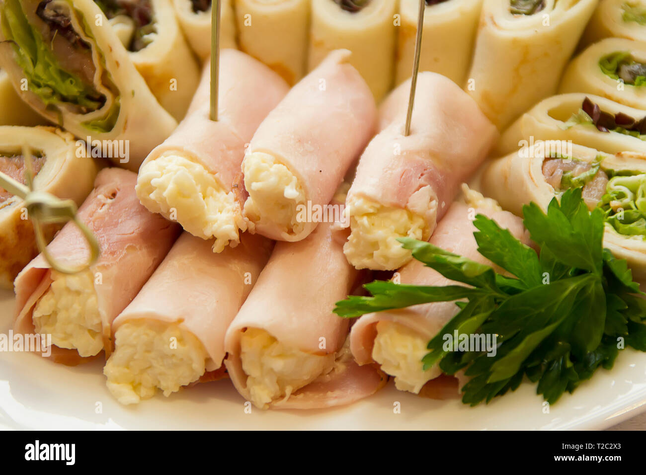 Buffet Snack Food.Snack food for a buffet table. Rolls with filling ...