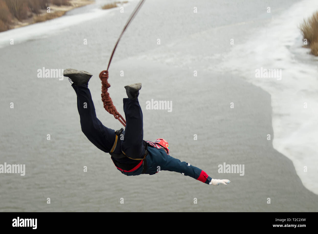 Man jumping cliff falling down hi-res stock photography and images - Alamy