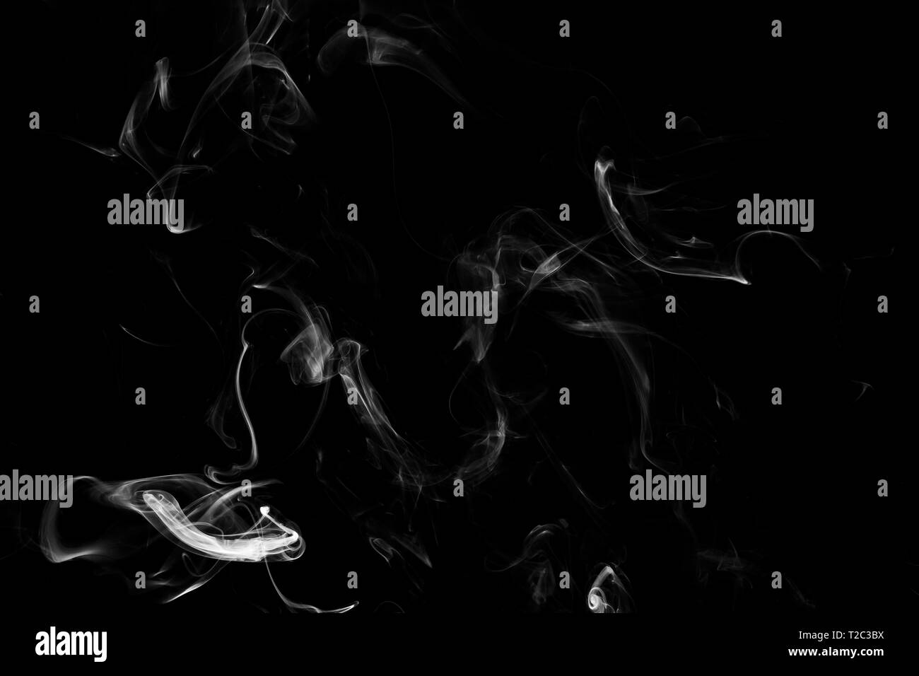 white smoke flame on a black background Stock Photo - Alamy