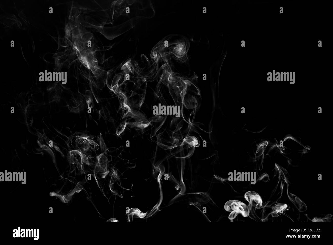 white smoke flame on a black background Stock Photo - Alamy