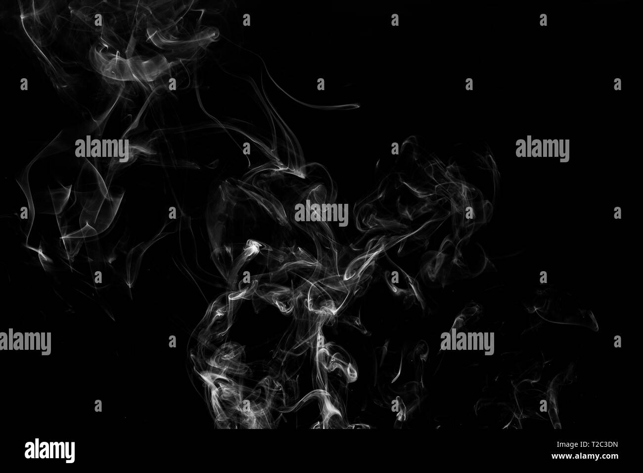 white smoke flame on a black background Stock Photo - Alamy