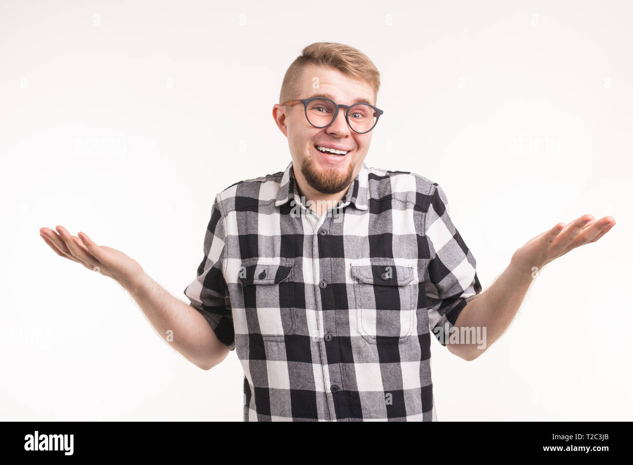 People, emotions and education concept - Student man gesturing shrug ...