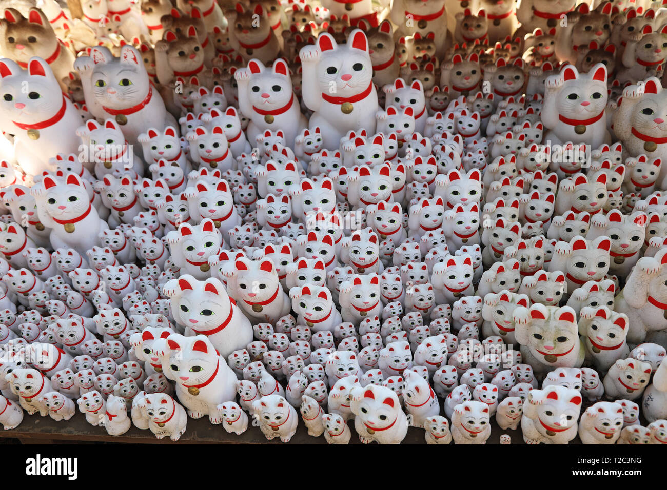 Maneki-Neko waving cat statues at the Gotokuji Temple in the Setagaya ...
