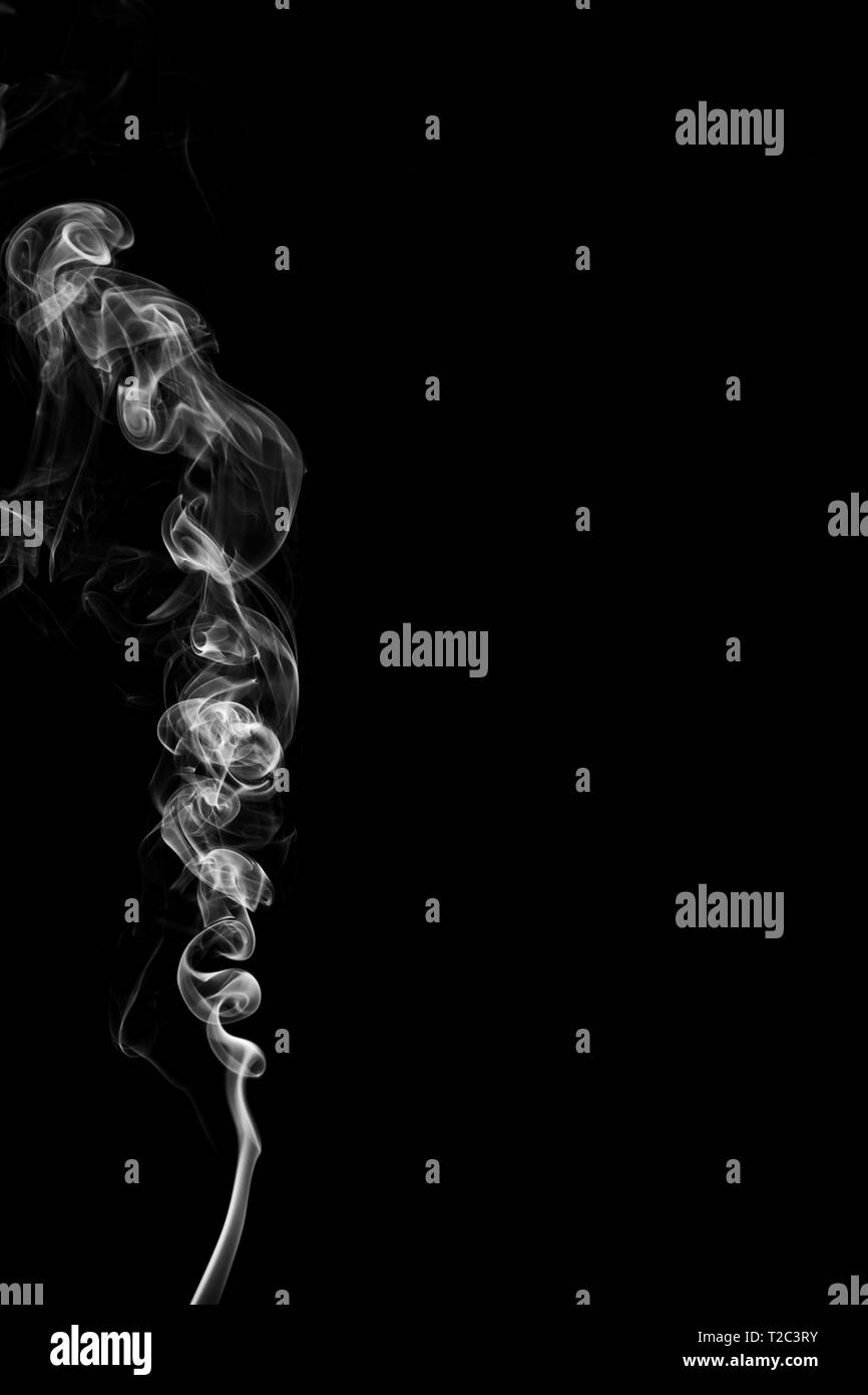 white smoke flame on a black background Stock Photo - Alamy