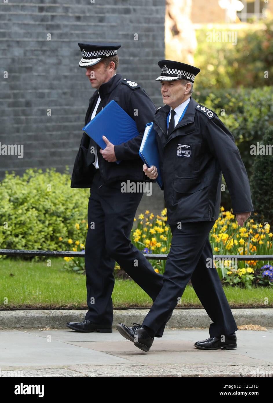 Metropolitan Police deputy commissioner Sir Steve House (right) arrives ...